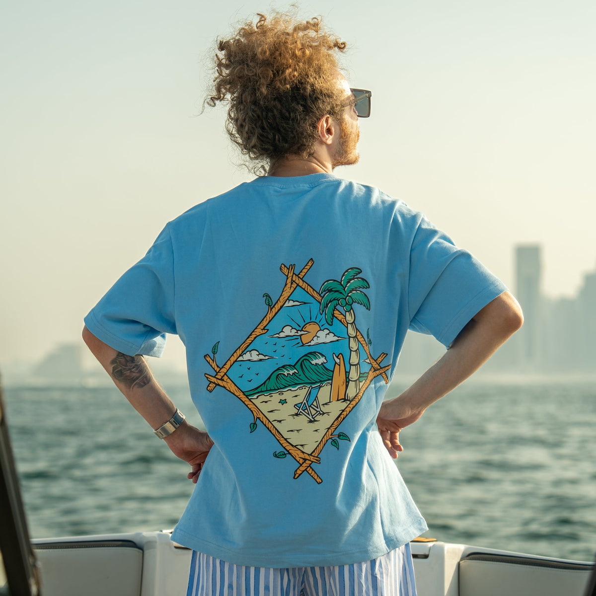 Shop Light Blue Oversized T-Shirt – Framed Beach Scene Print | Varkomz ...